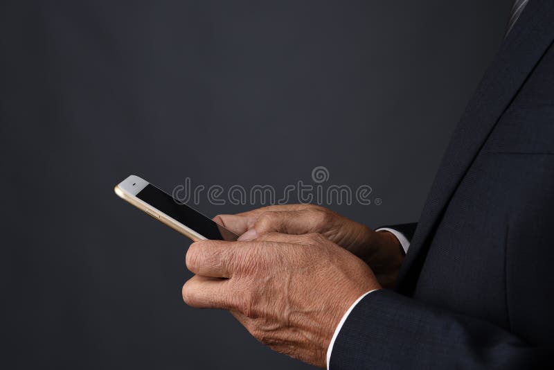 Closeup Side View of a Businessman Typing on His Cell Phone Stock Photo ...