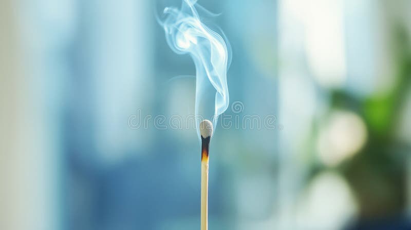 Closeup of a Single Lit Matchstick with Rising Smoke on a Blurred ...