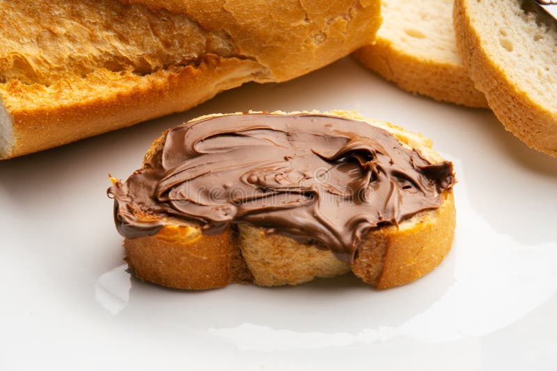 Closeup of a Slice of Loaf Bread with Chocolate Paste Spread on One ...