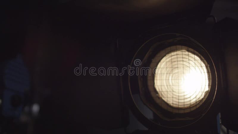 Closeup Slow Motion Footage of a Studio Spotlight Lights Slowly on Blur ...