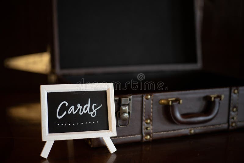 Closeup of a Small Blackboard with Cards Written on it on the Table ...