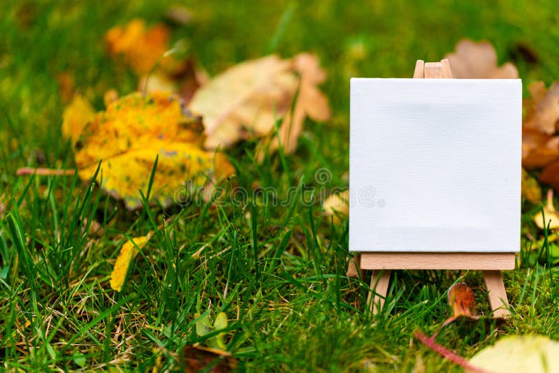 Closeup of a Small Canvas on a Stand on the Ground with Space for Text ...
