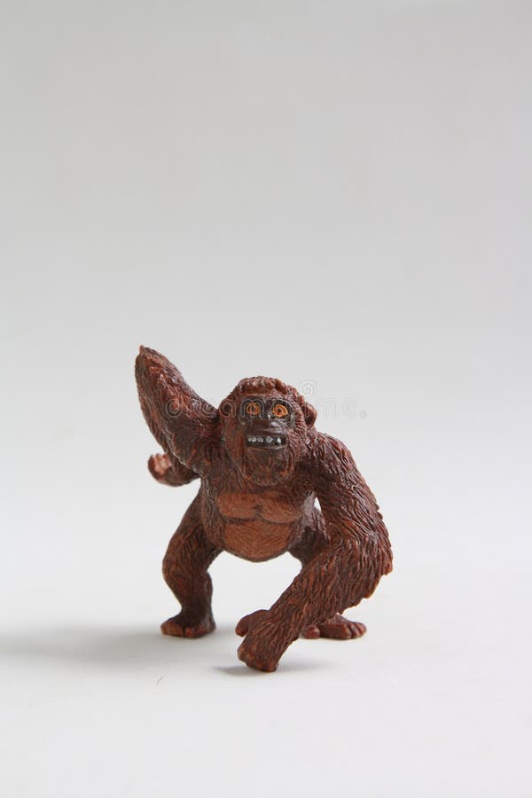 Closeup of a Small Rubber Ape Toy Isolated on a White Background Stock ...