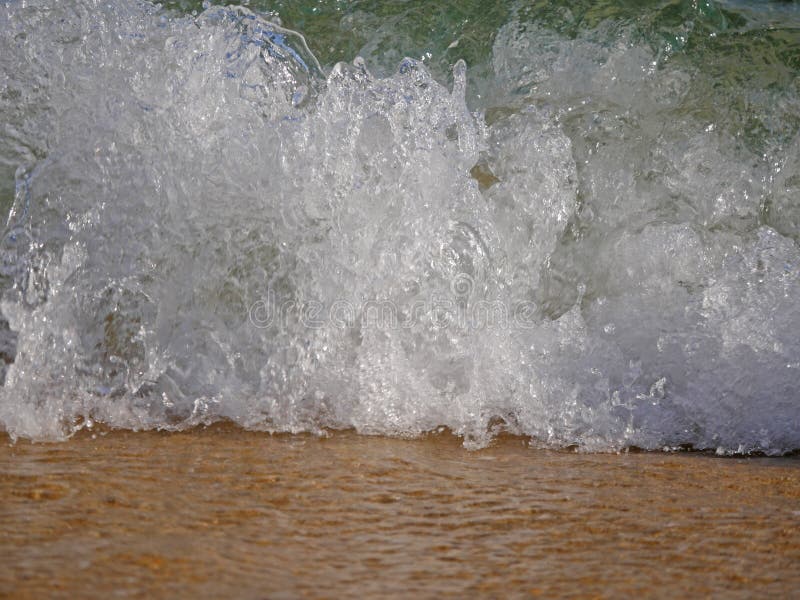 Closeup of a Small Wave Breaking Stock Photo - Image of stones, coast ...