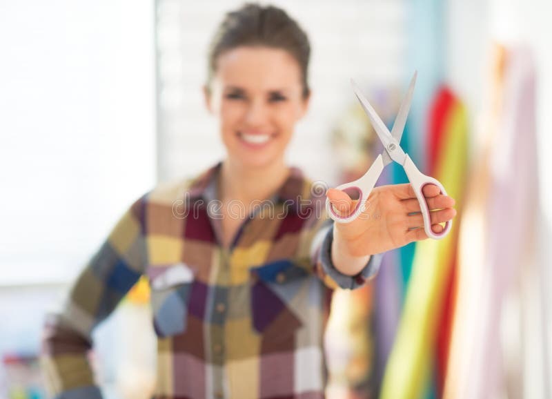 Closeup on Smiling Seamstress Showing Scissors Stock Image - Image of ...