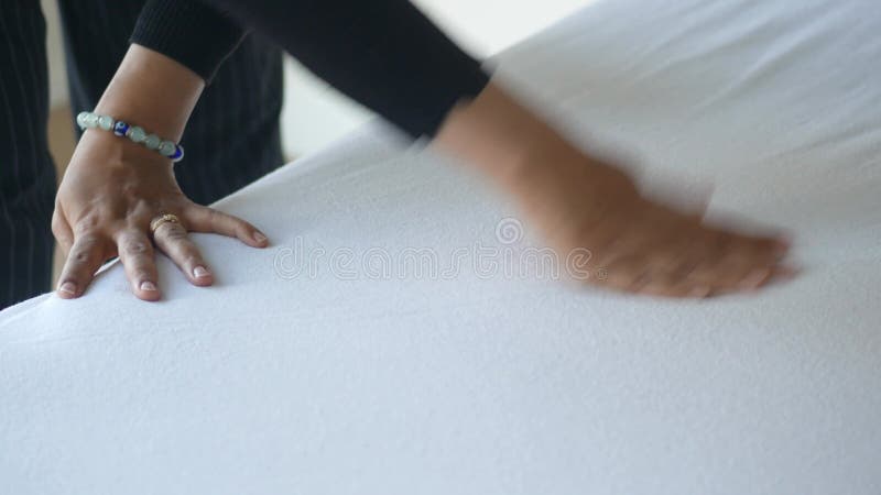 Gentle Hands Pressing on a Soft White Surface for a Calming and ...