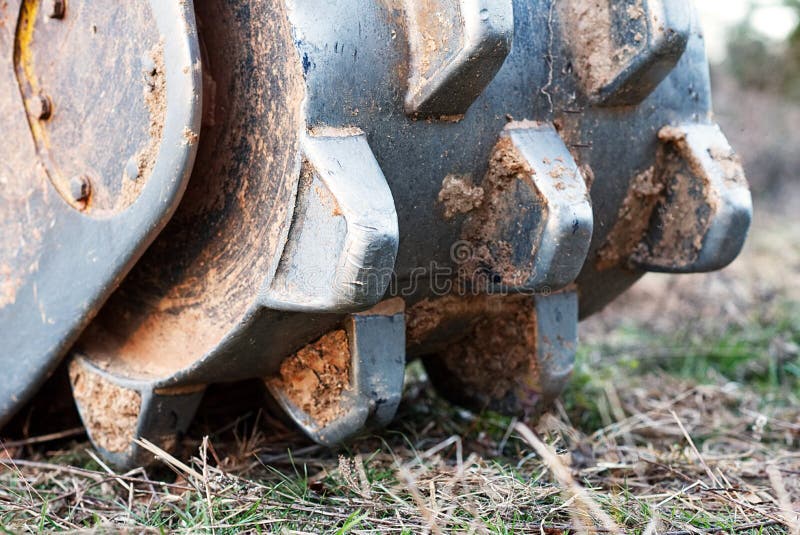 Closeup of a Soil Compactor on a Track Hoe. Stock Image - Image of dirt ...