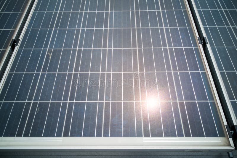 Closeup on Solar Panels with Reflection of the Sun Stock Photo - Image ...