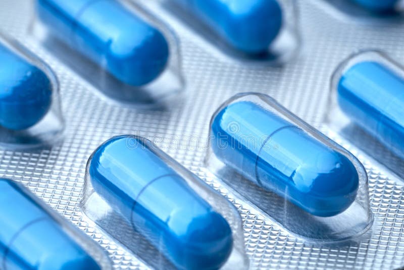 Closeup of Some Blue Pills in Packaging Stock Photo - Image of capsule ...