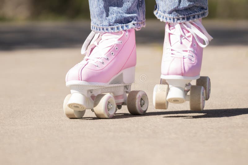 Two Pink Roller Skates with Yellow Wheels by AI Generated Image Stock ...