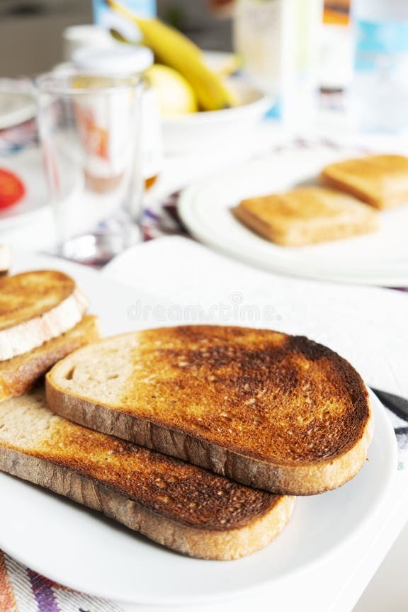 Toasts on a Table Set for Breakfast or Dinner Stock Photo - Image of ...