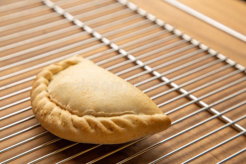 Closeup of a Spanish Delicacy Called Empanada on a Grill Stock Photo ...