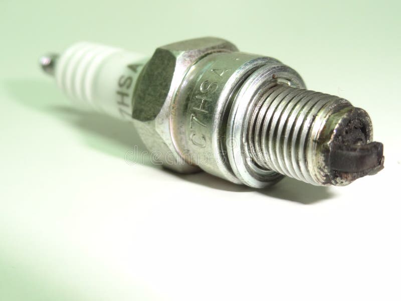 Closeup of a Spark Plug on the Light Surface Stock Photo - Image of ...