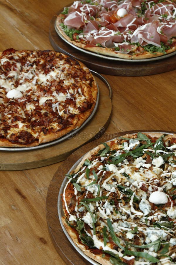 Closeup of Specialty Pizza with Mozzarella Ball in the Center Stock ...