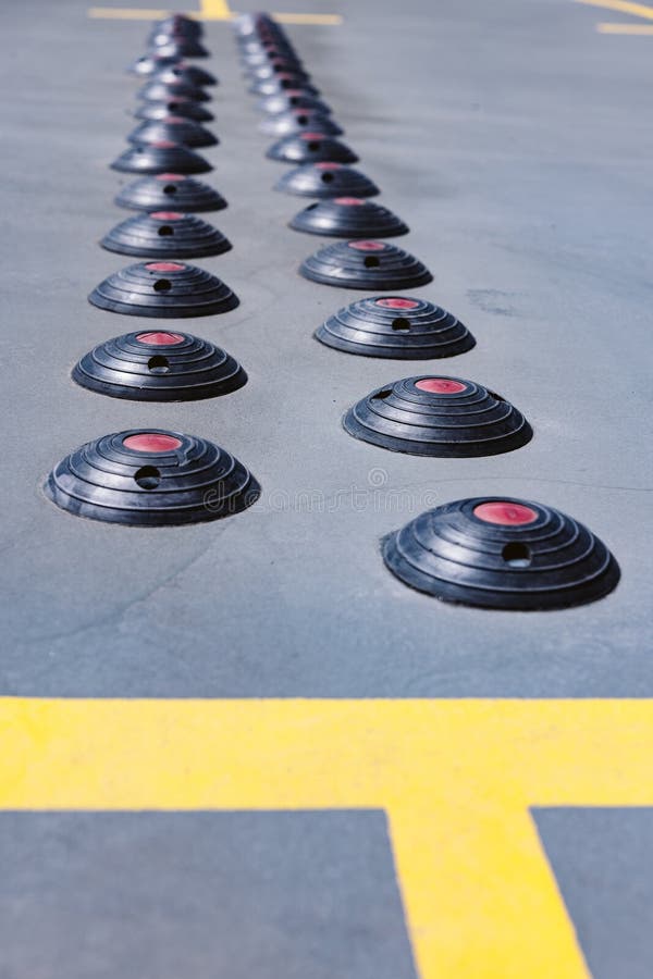 Closeup Speed Bumps on the Road Stock Image - Image of infrastructure ...