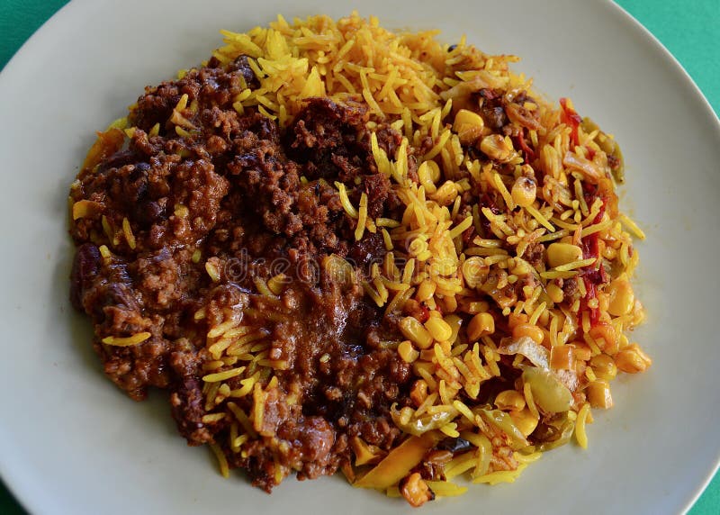 Mexican Beef with Yellow Rice and Beans Stock Photo - Image of ...