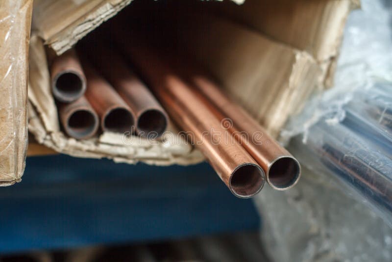 Closeup of a Stack of Copper Pipes for Water and Heating Systems, Soft ...