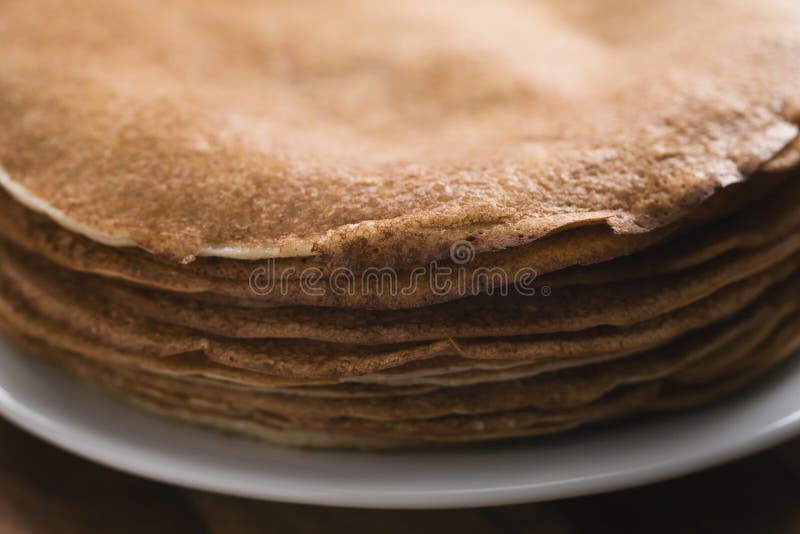Closeup Stack of Fresh Hot Crepes or Blinis on Wood Table Stock Image ...
