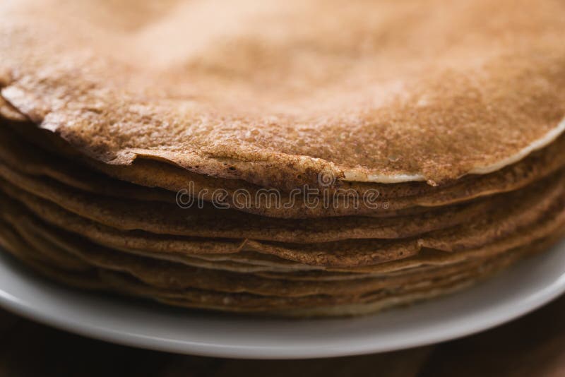 Closeup Stack of Fresh Hot Crepes or Blinis on Wood Table Stock Image ...