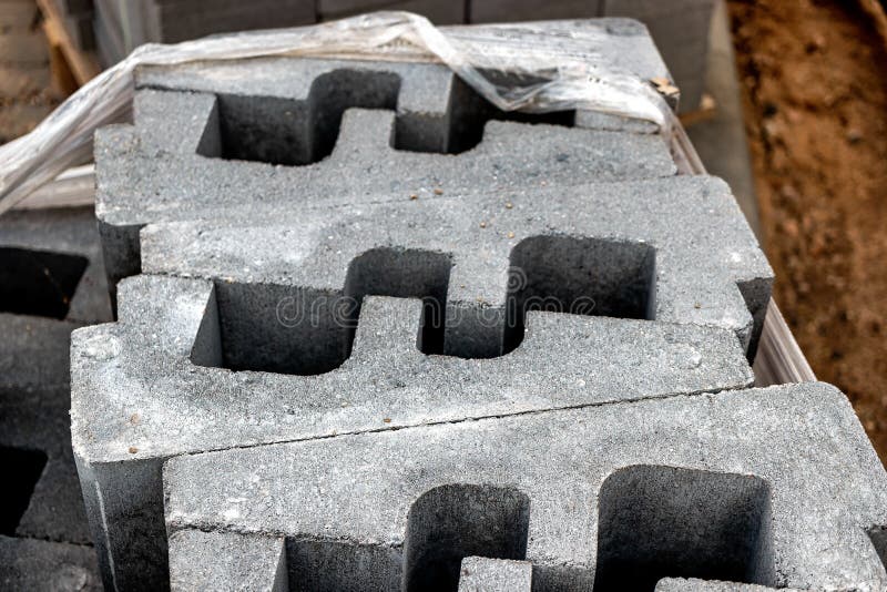 Closeup of Stacked Hollow Gray Concrete Bricks or Blocks from a ...