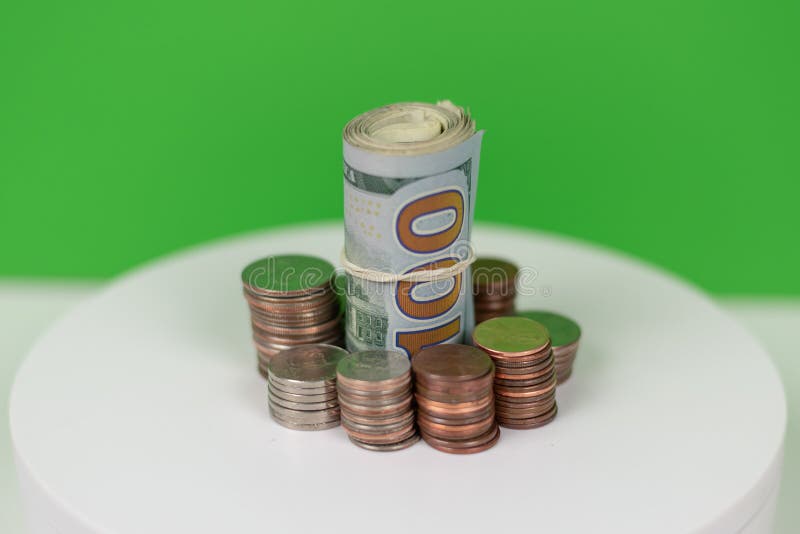Stacks of Coins and Roll of Paper Bills Stock Image - Image of ...