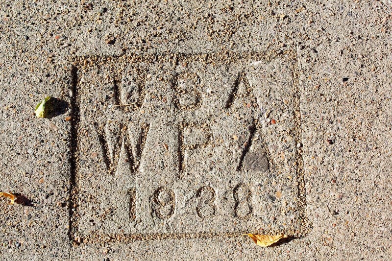 Closeup of a 1938 Stamp in Concrete for the WPA Program (Works Progress ...