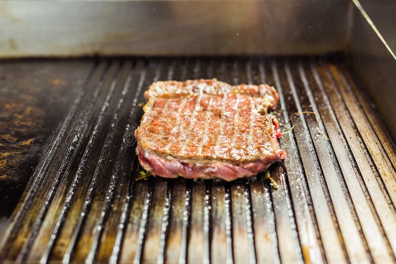 Closeup of a Steak on Grill Stock Image - Image of cooking, fire: 92416505