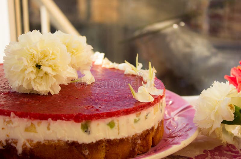 Closeup of a Strawberry Cake from Side on White Batskground Sponge Cake ...