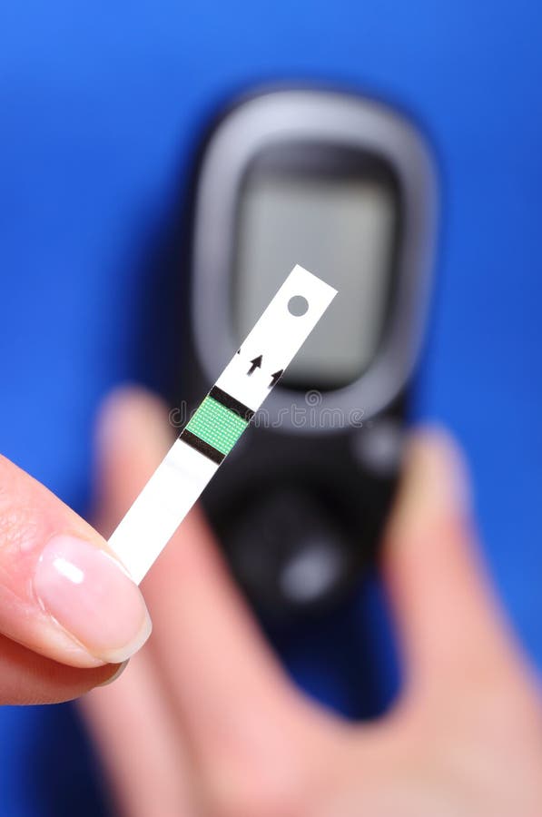 Closeup of Strip for Glucose Testing and Glucose Meter Stock Image ...