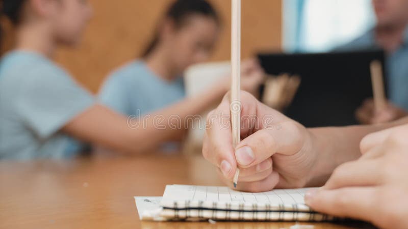 Cute Girl Looking Under Microscope while Student Doing Experiment ...