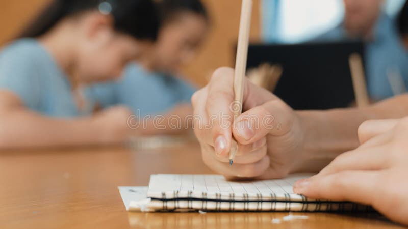 Closeup of Student Hand Taking a Note while Girl Ask Question ...