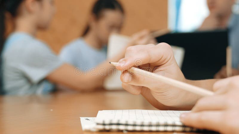 Closeup of Student Hand Taking a Note while Girl Ask Question ...