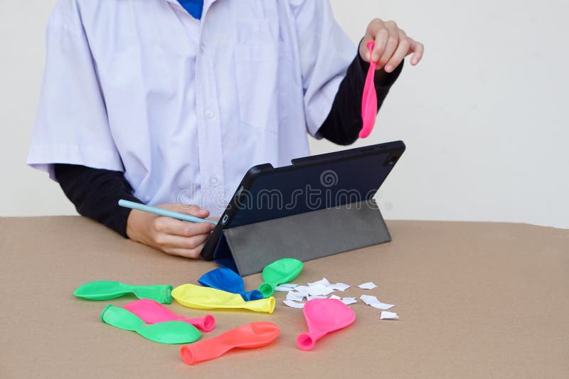 Closeup Student Writes on Smart Tablet during Studying about Static ...