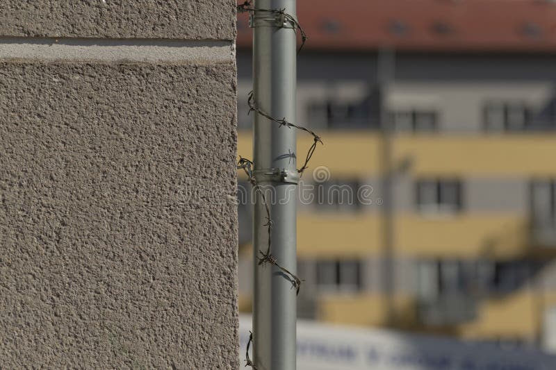 Closeup of a Sturdy Metal Pole with a Building in the Background Stock ...