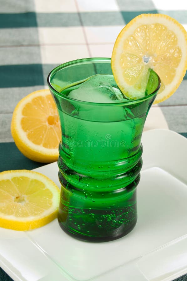 Closeup of Summer Drink in a Green Glass with Lemons Stock Photo ...