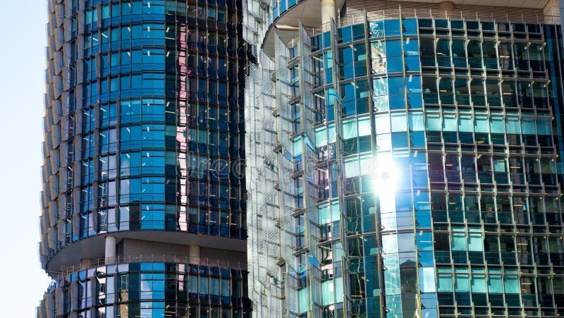 Closeup of Blue Windows in Round Office Buildings Stock Image - Image ...