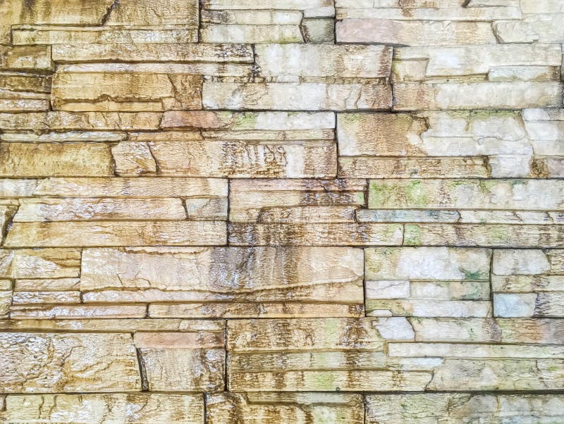 Closeup Surface Brick Pattern at Old and Dirty Wet Stone Brick Wall ...