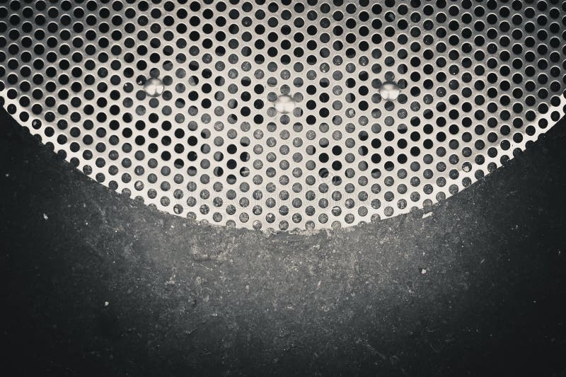 Closeup of a Surface with a Pattern of Circular Holes in a Metal Grille ...