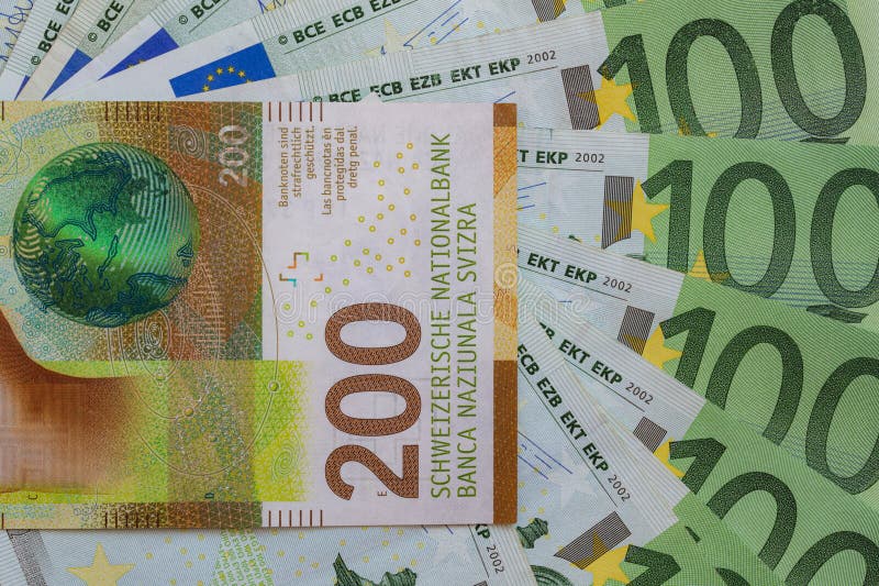 Closeup of 200 Swiss Franc Banknote and 100 Euro Banknotes Stock Image ...