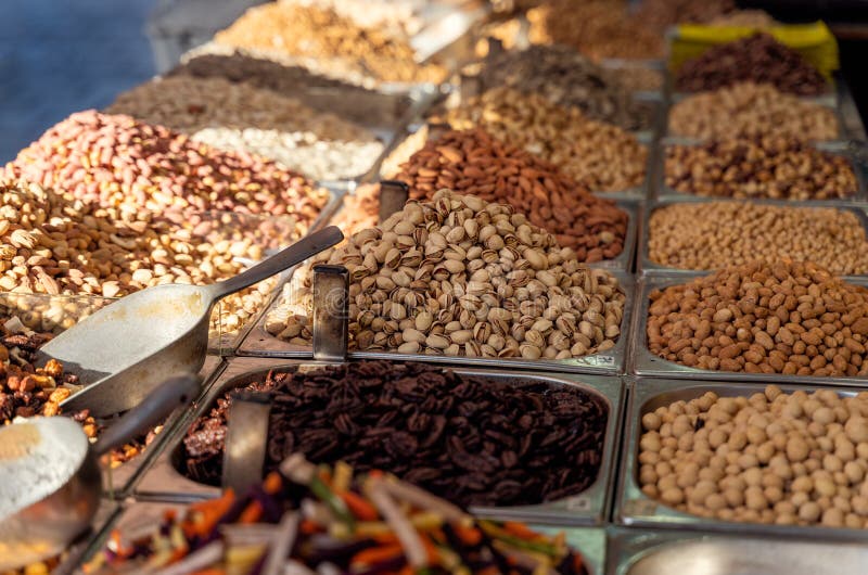 Closeup of a Table of Different Types of Peanuts for Sale Stock Photo ...