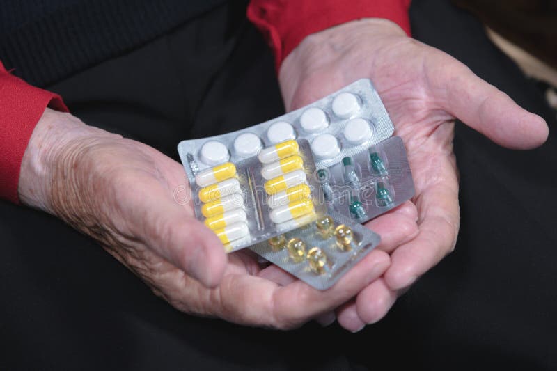 Closeup of a Tablet on the Hands of an Old Woman. the Concept of ...