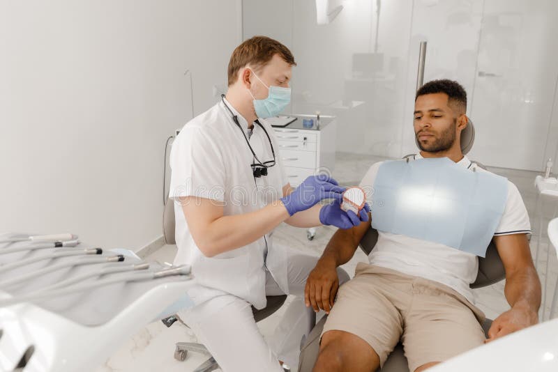 Closeup Taking Details at Dental Clinic the Dentist Showing How the ...