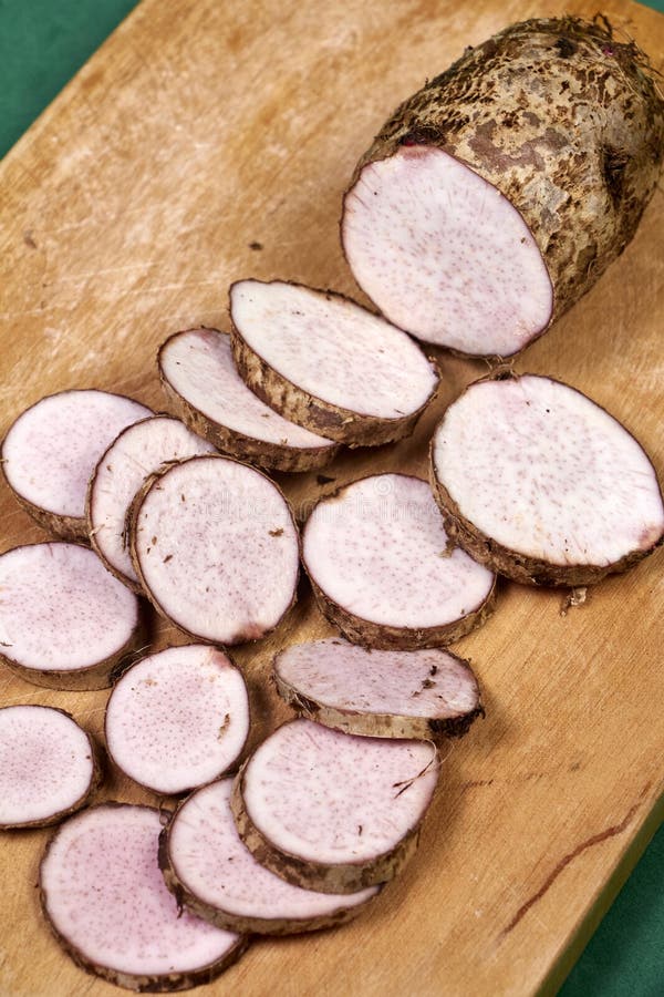 Closeup of Taro Root Vegetable, Eddo Malanga, Green Background Stock ...