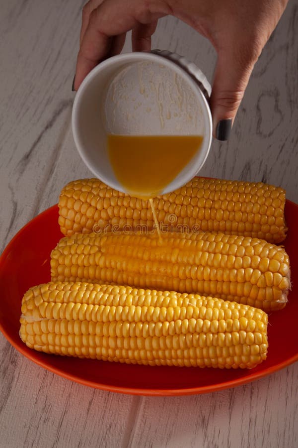 Closeup of Tasty Corn with Melted Butter Pouring on it Stock Image ...