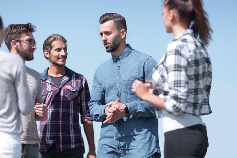 Closeup .a Team of Friends is Discussing Stock Photo - Image of ...