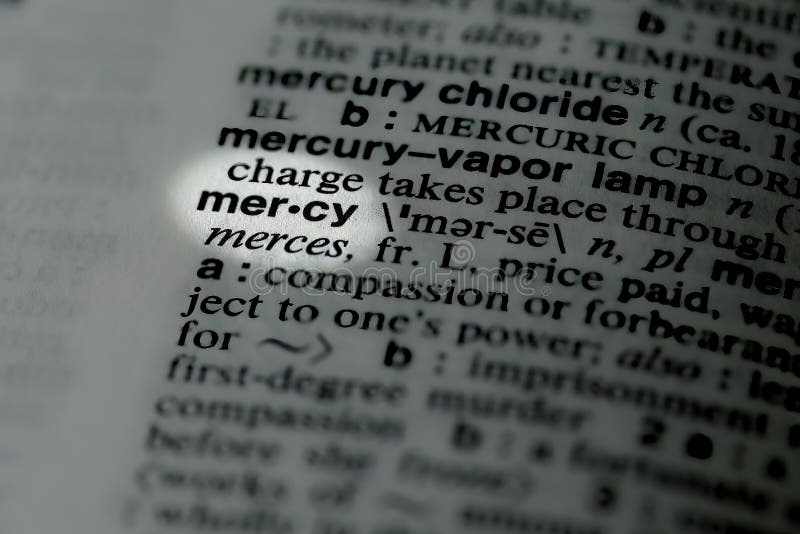 Closeup of Term and Definition of Mercy Printed and Highlighted in ...