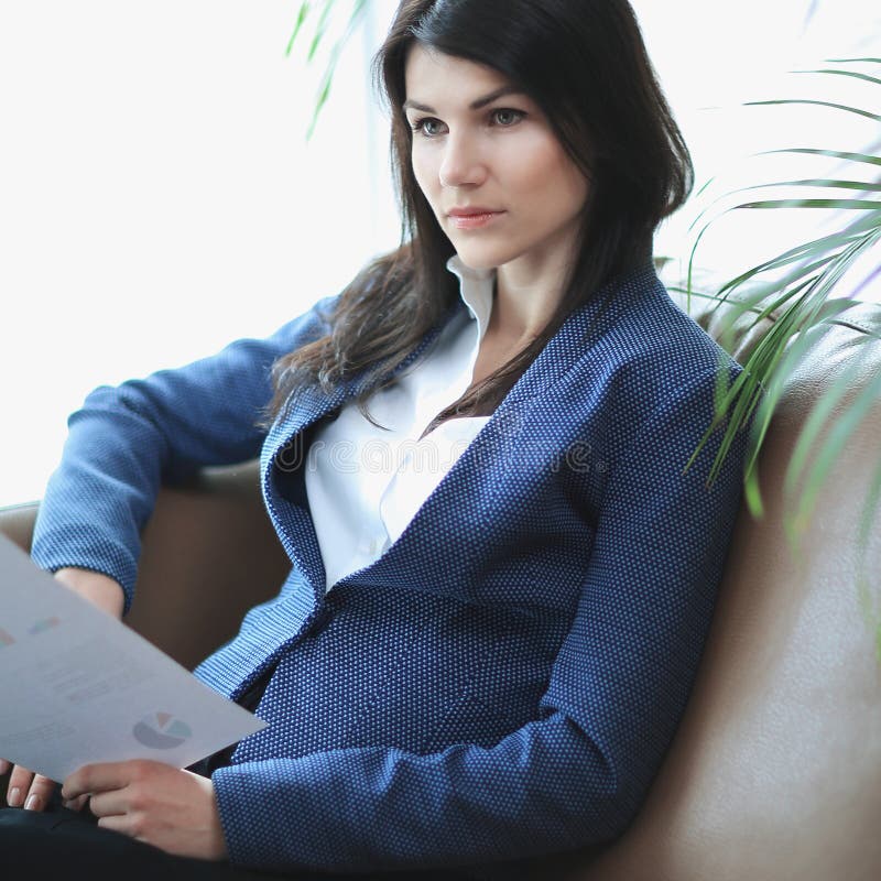 Close Up. Thoughtful Business Woman Sitting in Office Chair. Stock ... Close Up. Thoughtful Business Woman Sitting in Office Chair. Stock ...