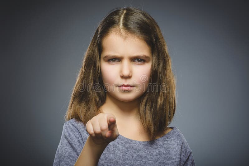 Closeup Thoughtful or Contemptuous Girl Show at Camera Isolated on Gray ...
