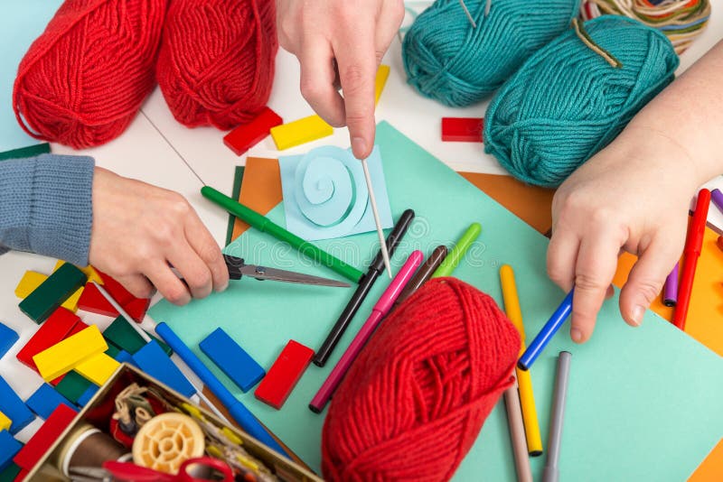 Closeup with Three Hands and a Lot of Handicraft Materials Stock Photo ...