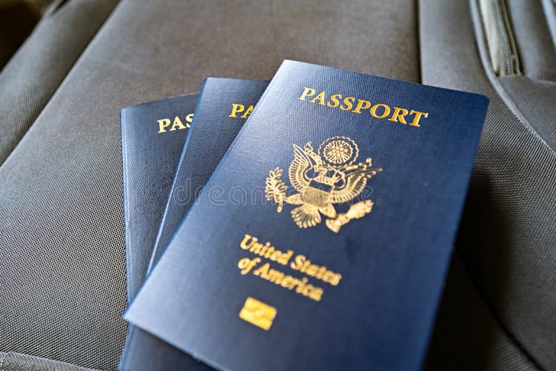 Three United States Passports Stock Photo - Image of luggage, business ...